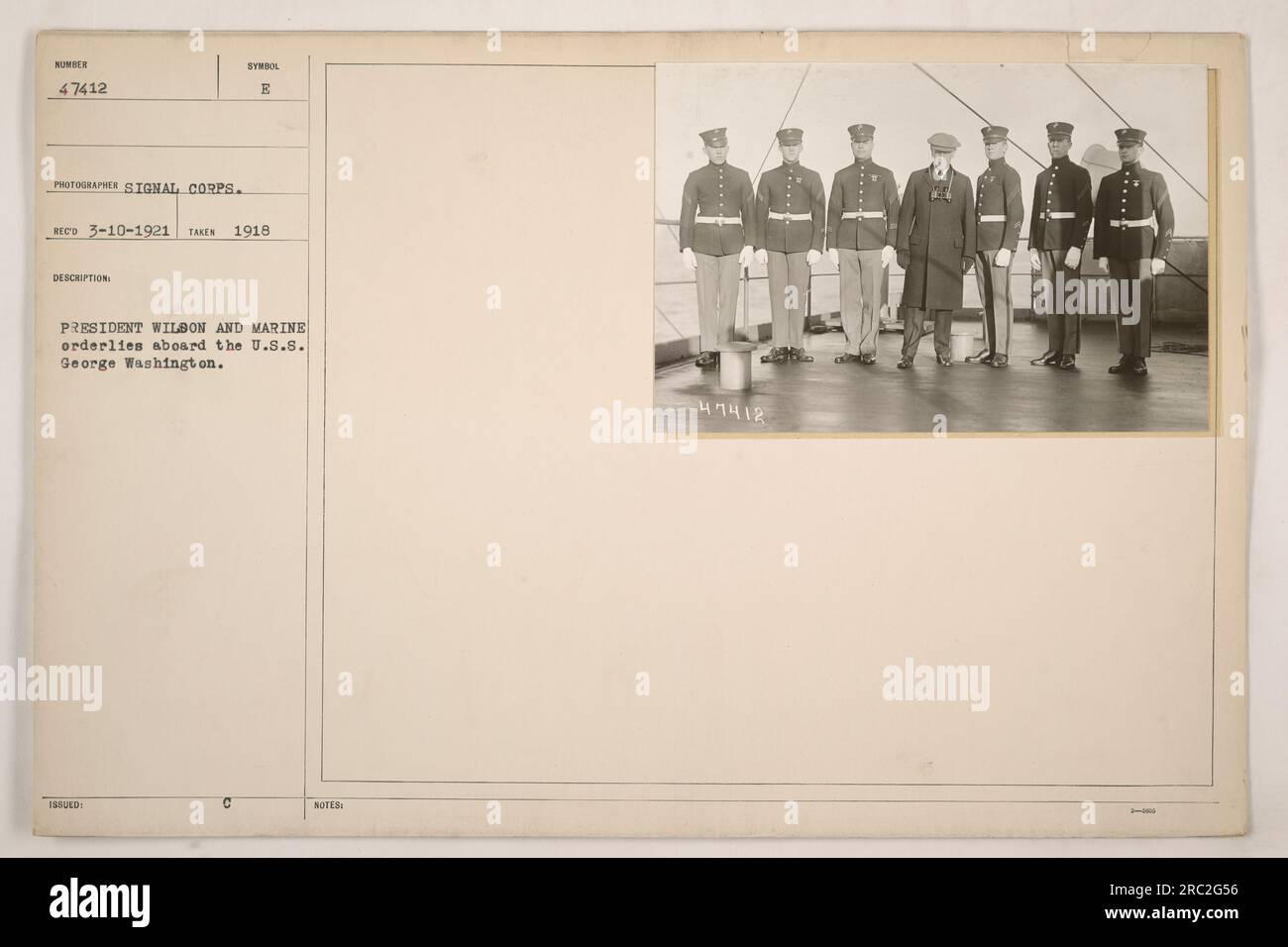 President Wilson and Marine orderlies are seen aboard the U.S.S. George ...
