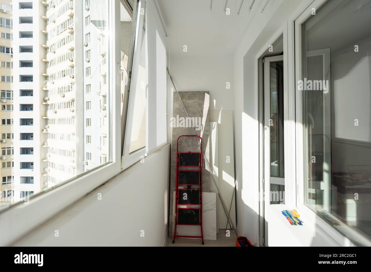 interior of a long apartment balcony Stock Photo - Alamy