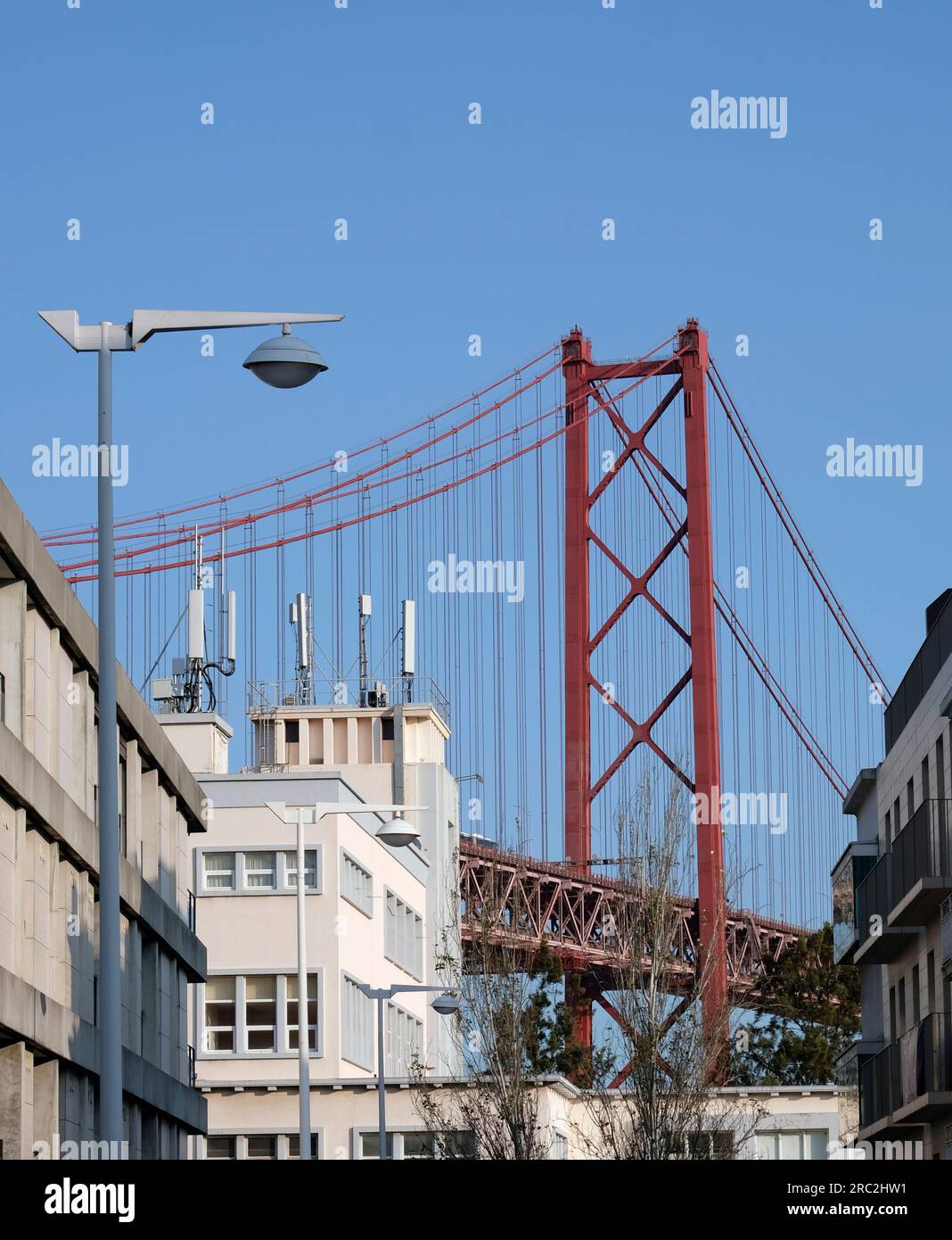 The "Ponte 25 de Abril" bridge in Lisbon, Portugal, seen behind some ...