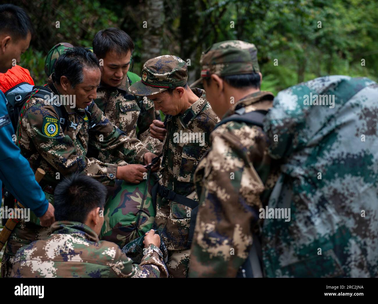 (230712) -- LUSHUI, July 12, 2023 (Xinhua) -- Rangers arrange their ...