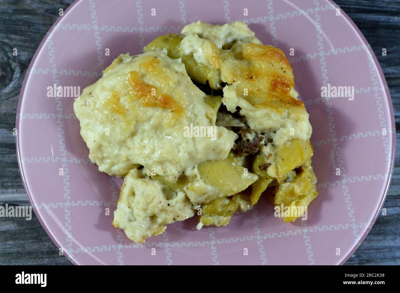 Baked zucchini courgette bechamel sauce and ground minced meat and ghee ...