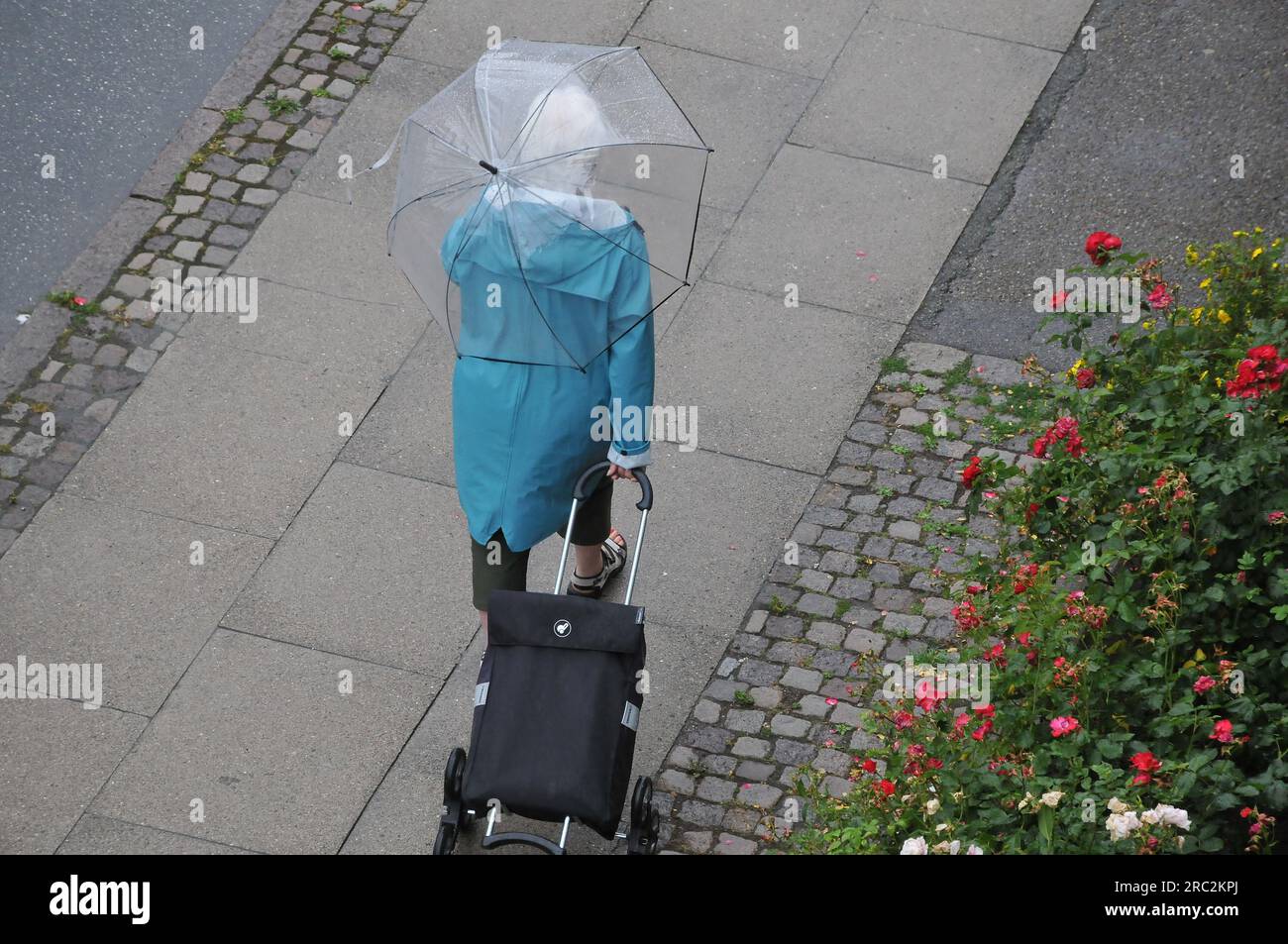 Rainy cloths hi-res stock photography and images - Alamy