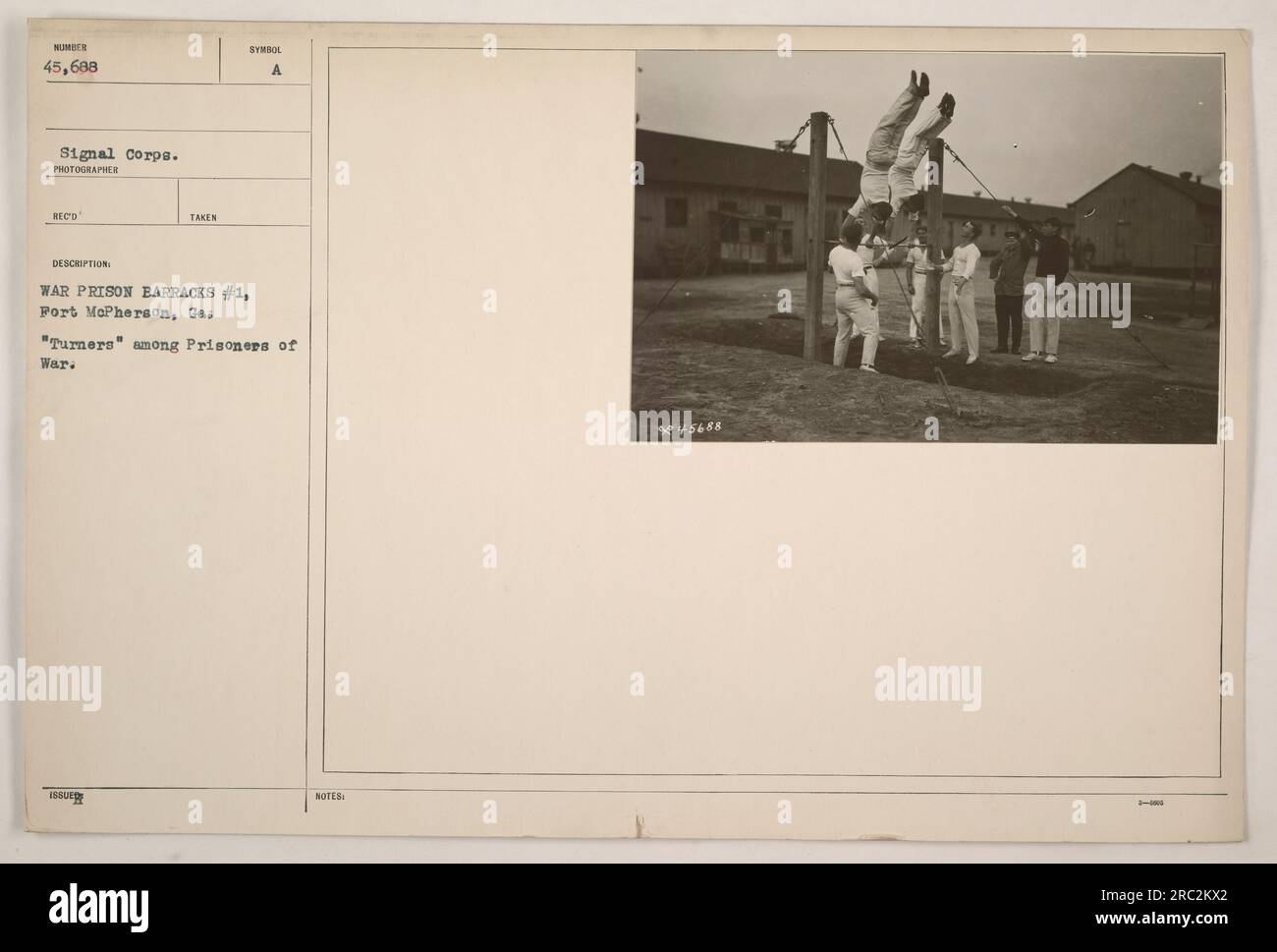 Image shows "Turners" among the prisoners of war engaging in gymnastics ...