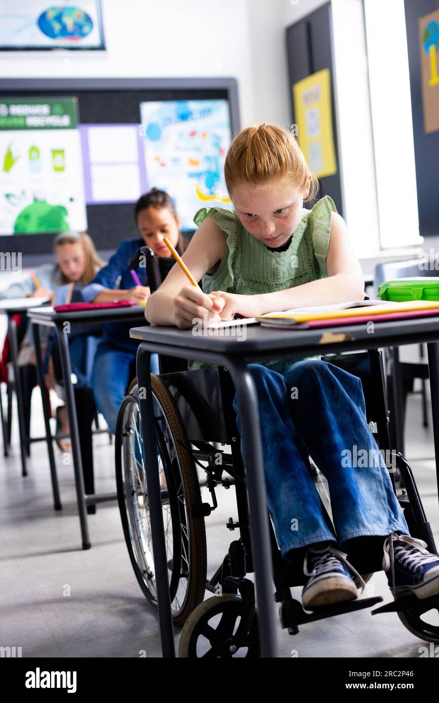 Child In Wheelchair In Classroom