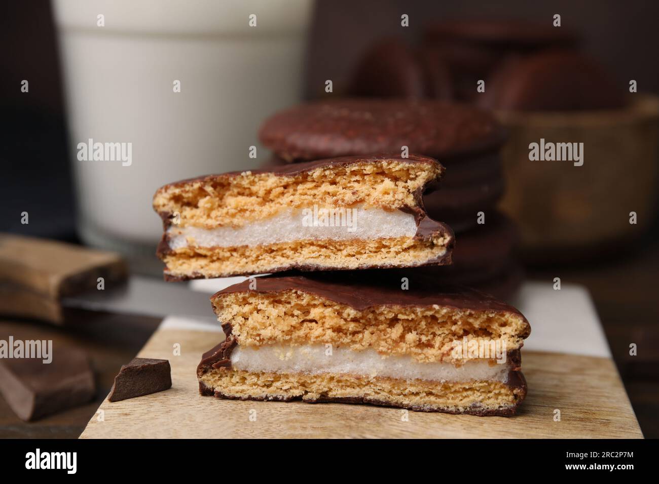 Tasty choco pies on coaster, closeup view Stock Photo - Alamy