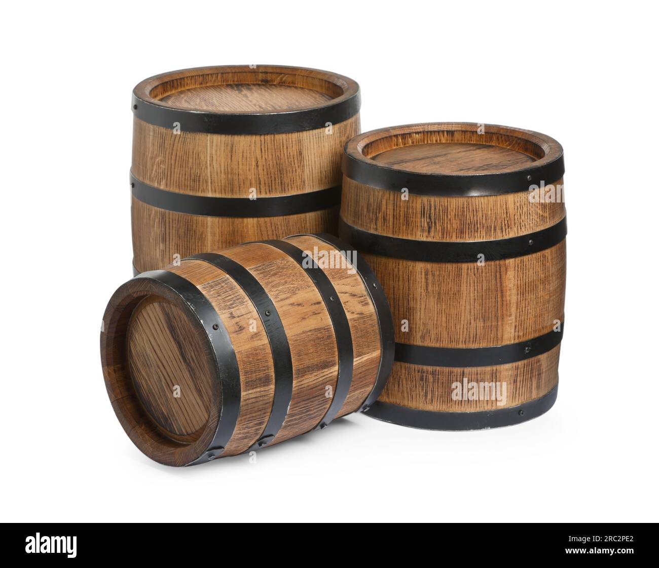 Three traditional wooden barrels on white background Stock Photo - Alamy