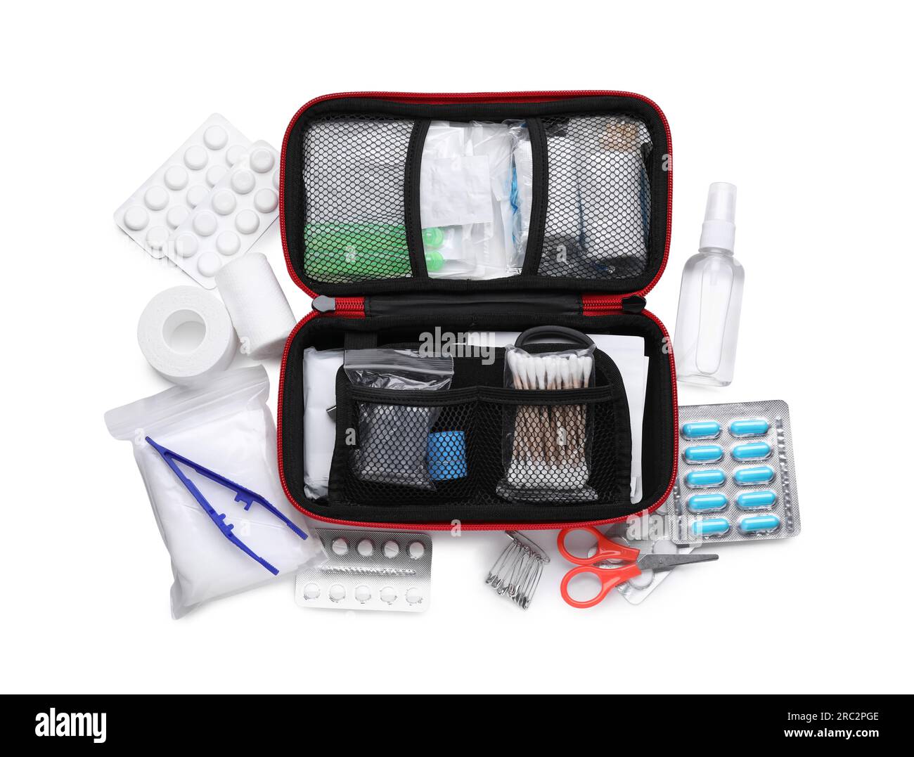 First aid kit, scissors, pins, cotton buds, pills, plastic forceps ...