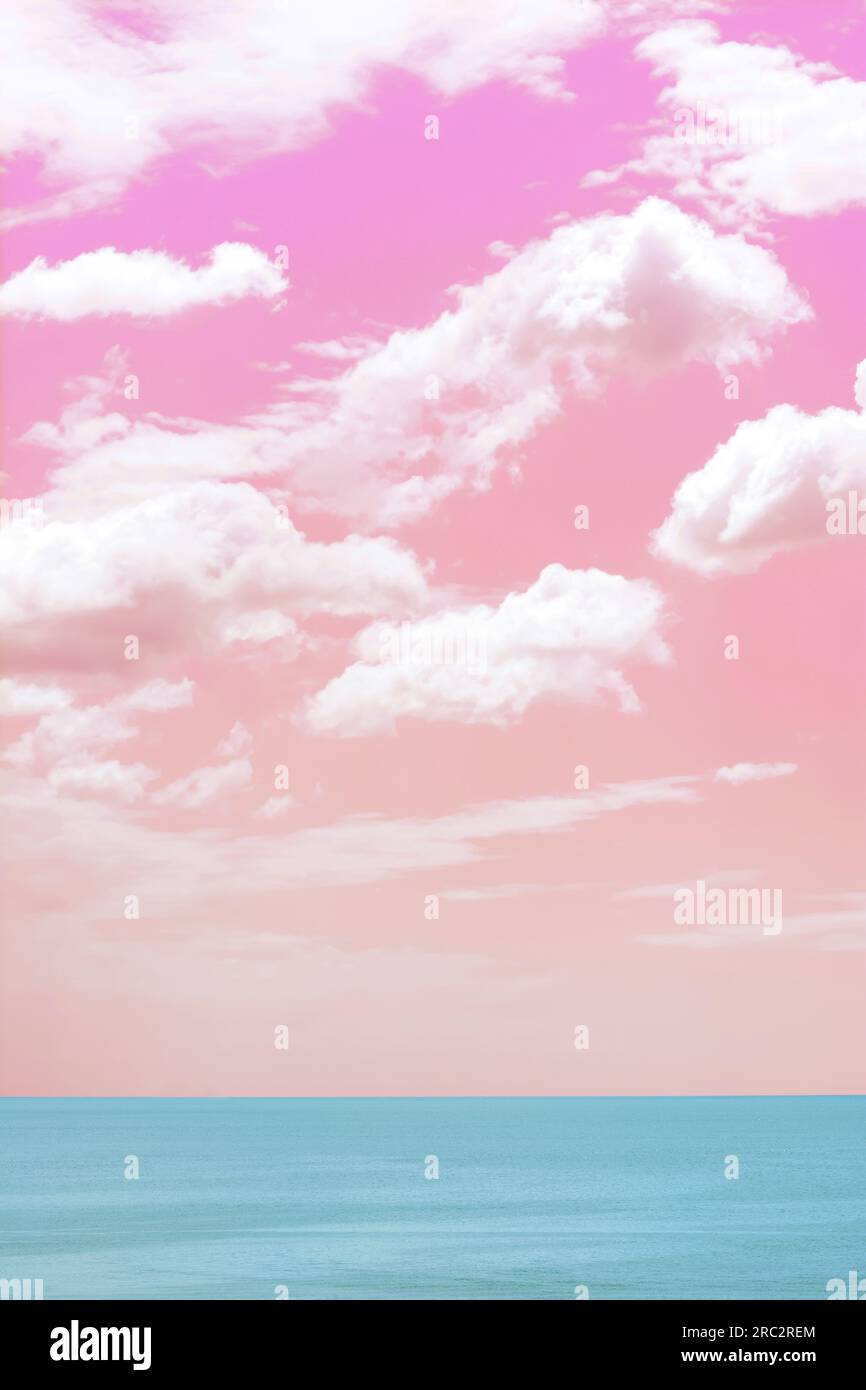 Picturesque pink and coral sky with fluffy clouds over ocean Stock ...