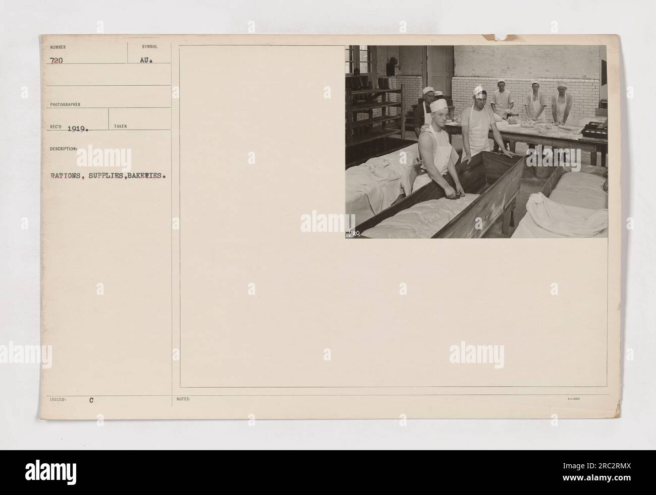 Soldiers preparing bread dough for baking during World War I. The ...