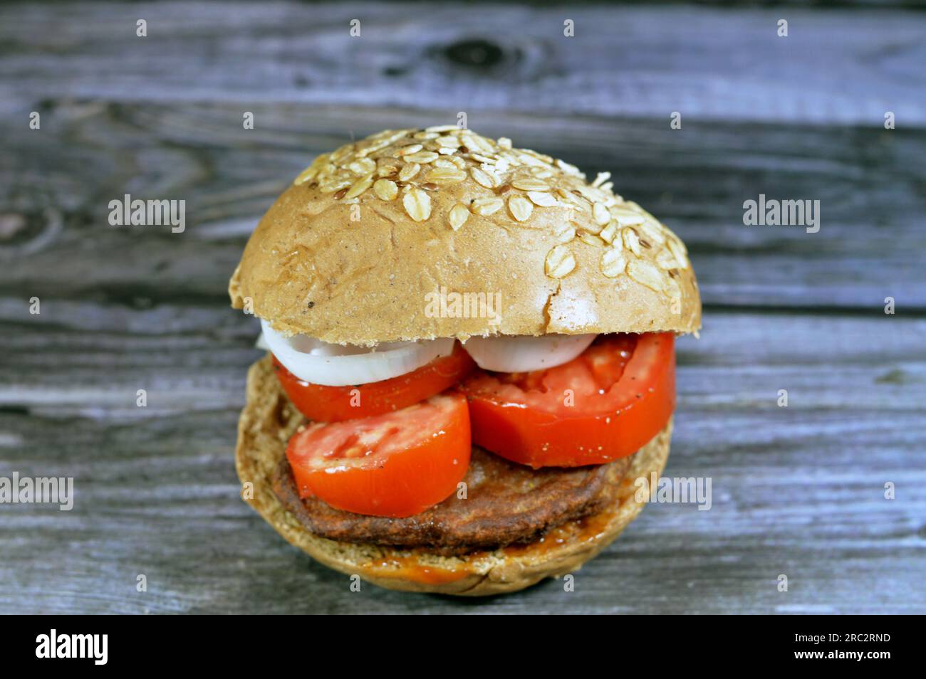 spicy fried beef burger cooked in a boiling shallow oil with slices of ...