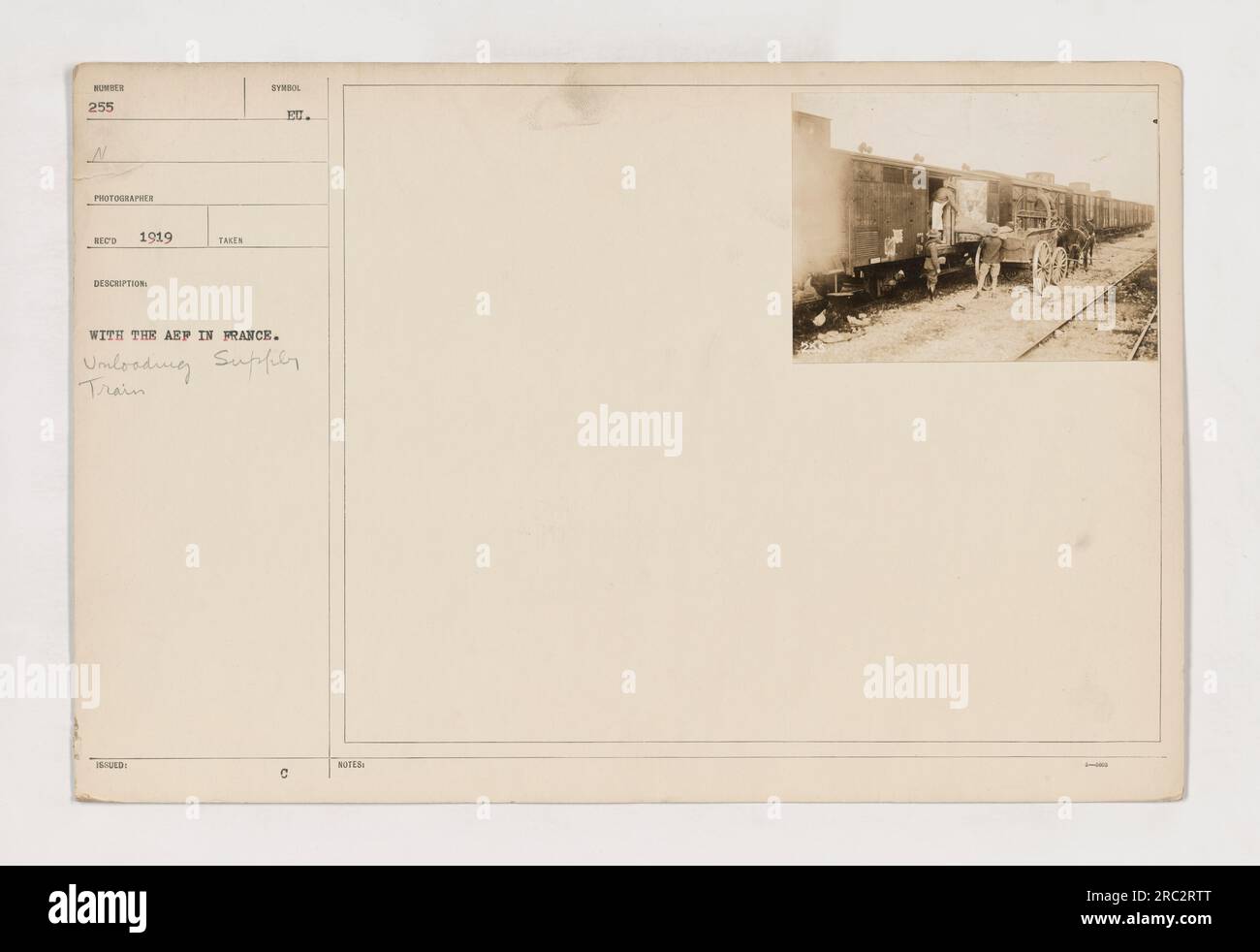 Supply trains unloading in France during World War One. The image shows ...