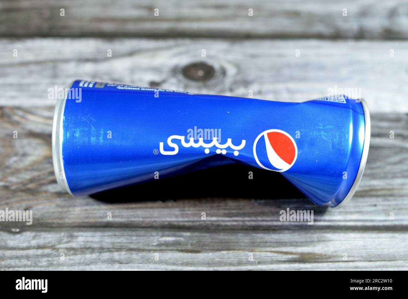 Cairo, Egypt, June 24 2023: Crushed Pepsi can, Cola flavor plastic ...
