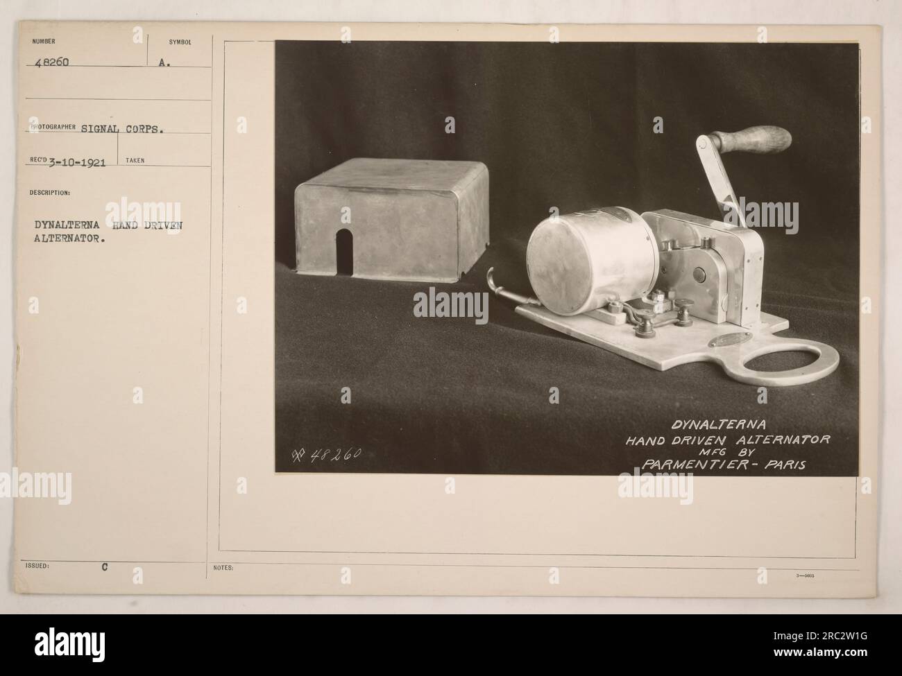 A soldier from the Signal Corps is using a Dynalterna Hand Driven ...