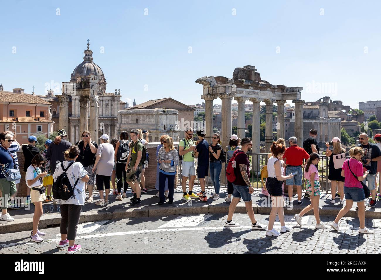 Tourists battle to find the perfect spot to view the dramatic ruins at ...