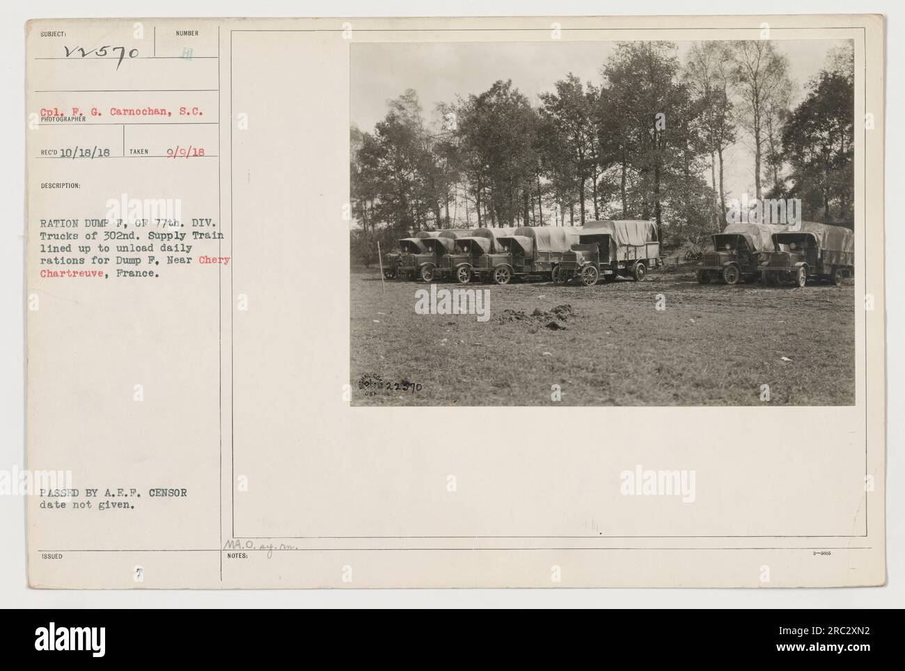 Trucks belonging to the 302nd Supply Train are seen lined up near Chery ...