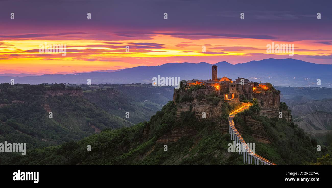 A wide 2:1 panorama photo from a sunrise at the Civita di Bagnoregio, a ...