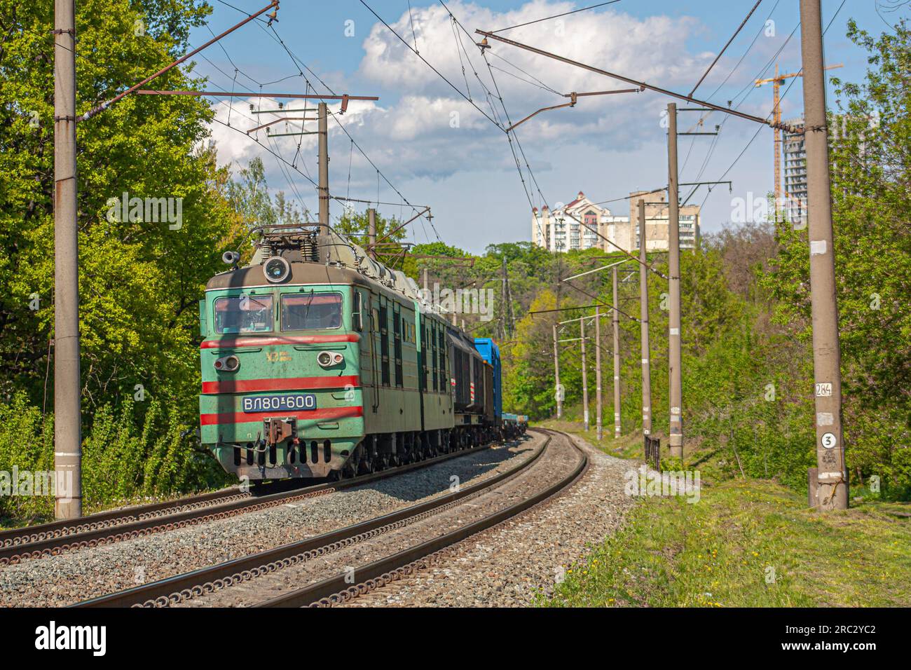 cargo train follows it's route Stock Photo - Alamy