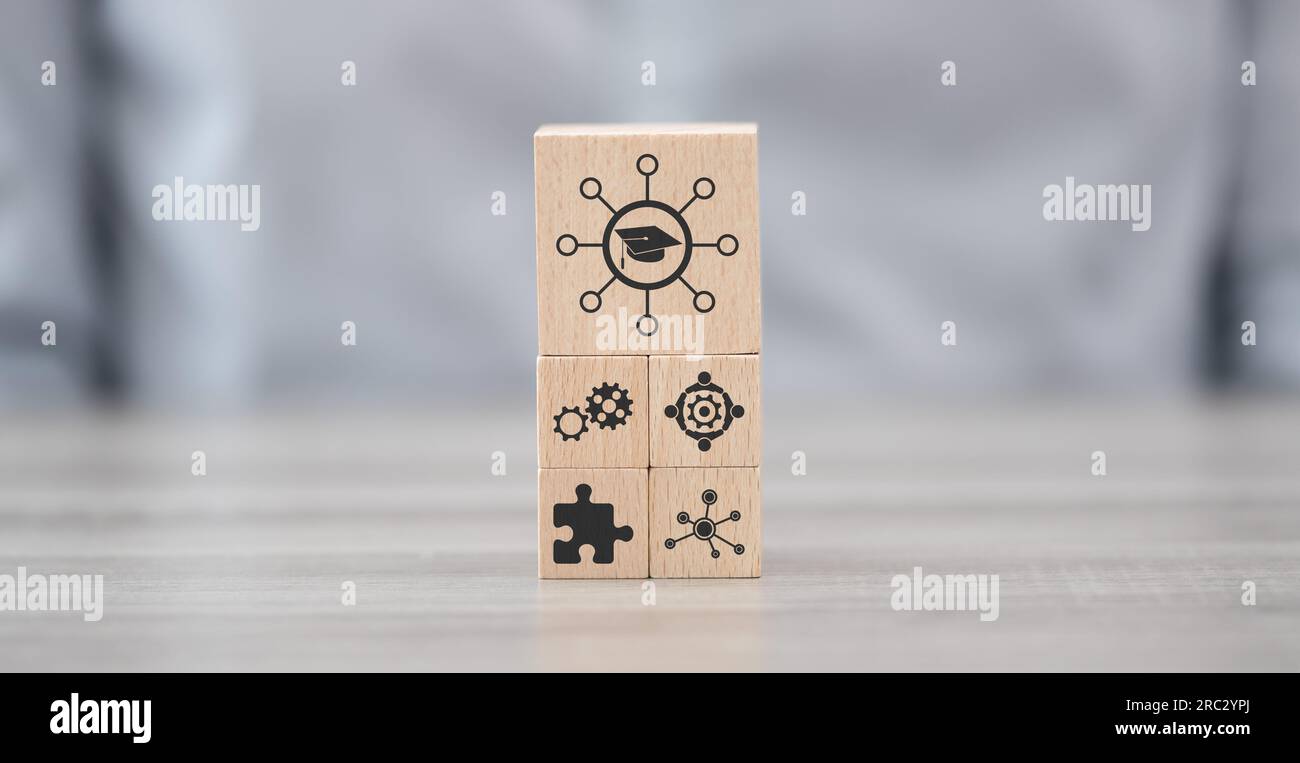 Wooden blocks with symbol of knowledge sharing concept Stock Photo - Alamy