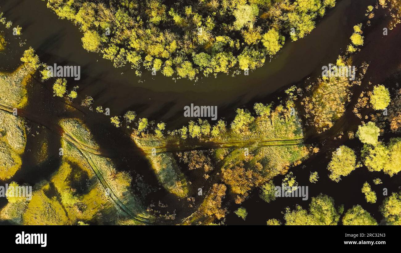 Fast take off Flat View Aerial View Green Forest Woods And Curved River ...