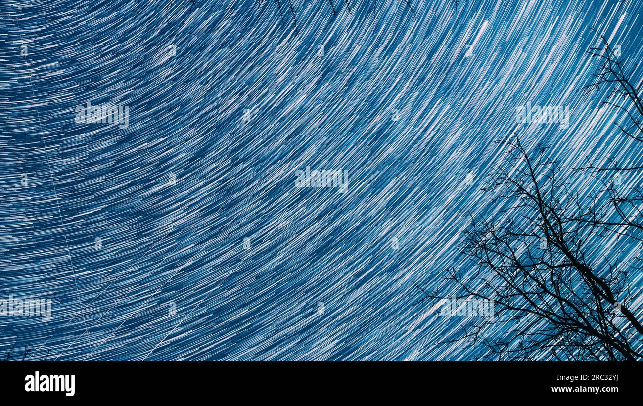 Bright Blue Cosmic Conception. Hyperlapse Spin Trails Of Stars Above ...