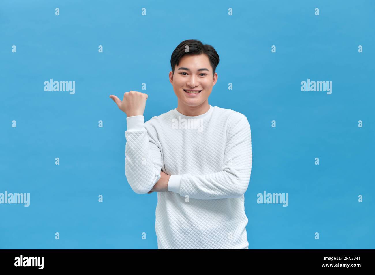 Pointing behind with her thumb hi-res stock photography and images - Alamy