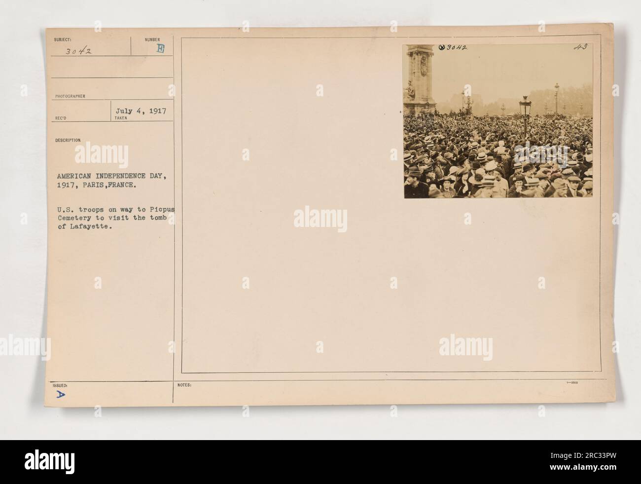 American soldiers marching in Paris on Independence Day, 1917. They are ...