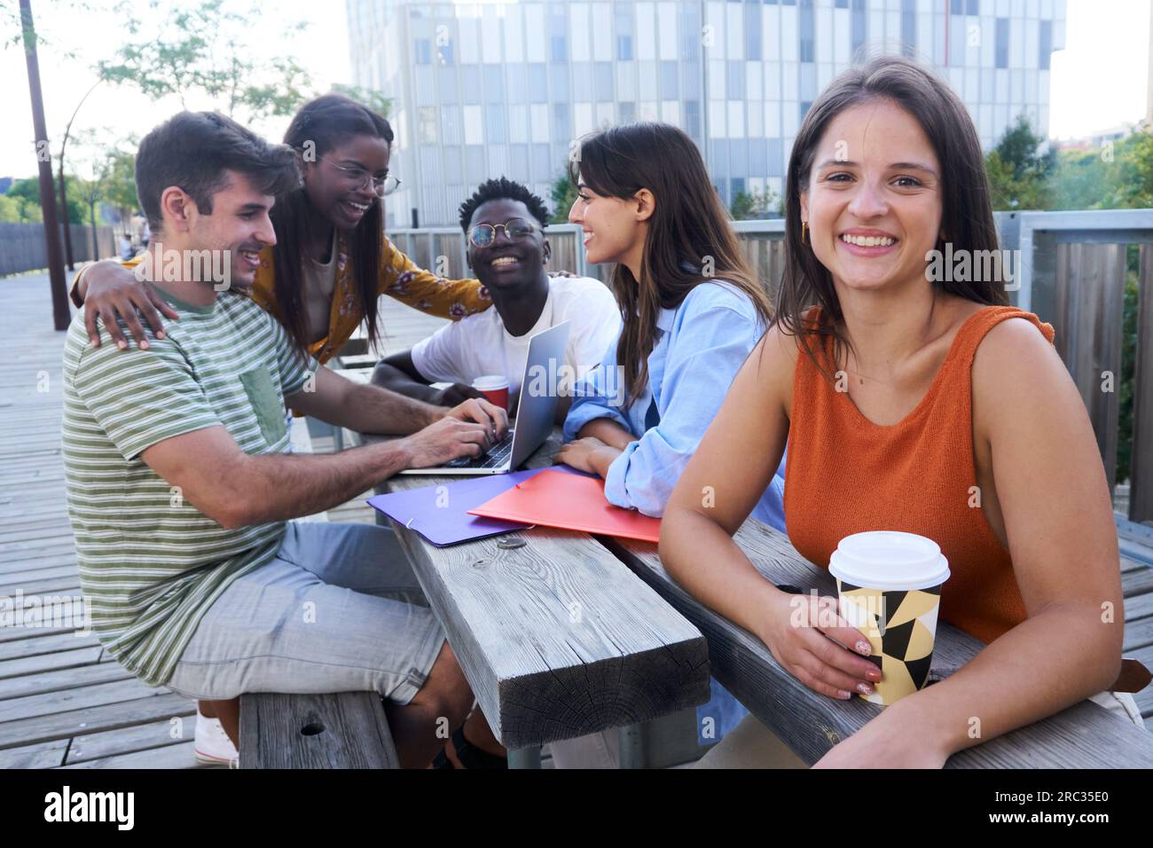 Multiethnic classmates meeting college campus hi-res stock photography ...