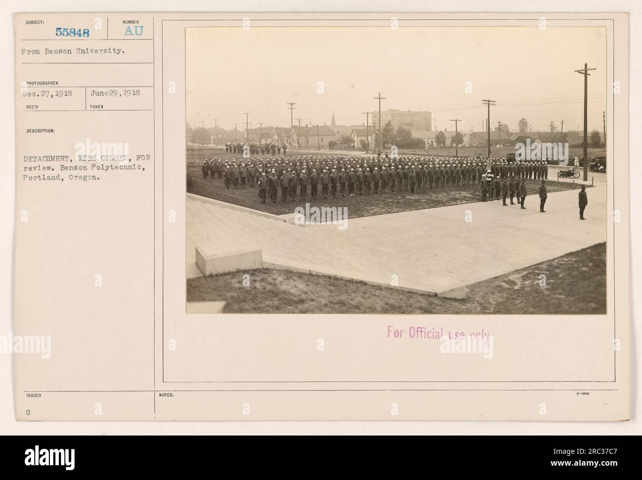 Detachment of soldiers holding colors for review at Benson Polytechnic ...