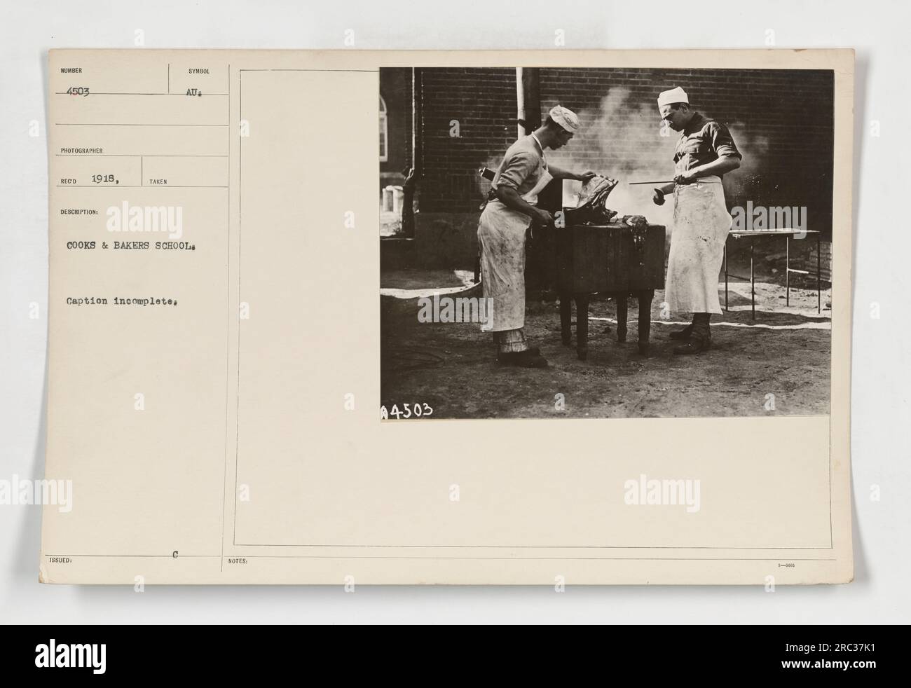 Soldiers attending a cooks and bakers school during World War I. The ...