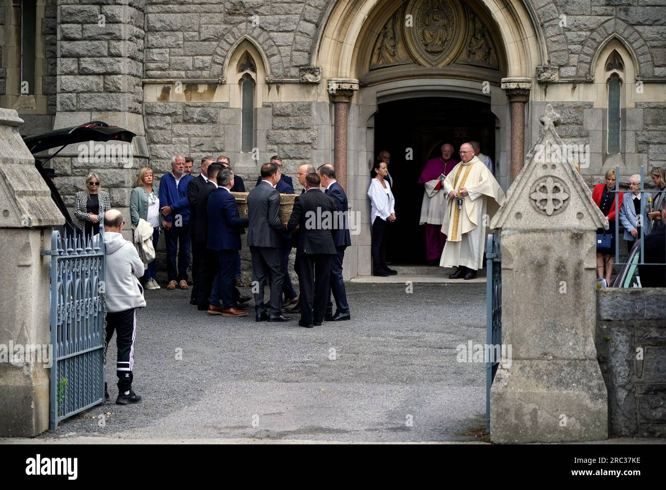 The coffin of 18-year-old Andrew O'Donnell is carried into The Church ...