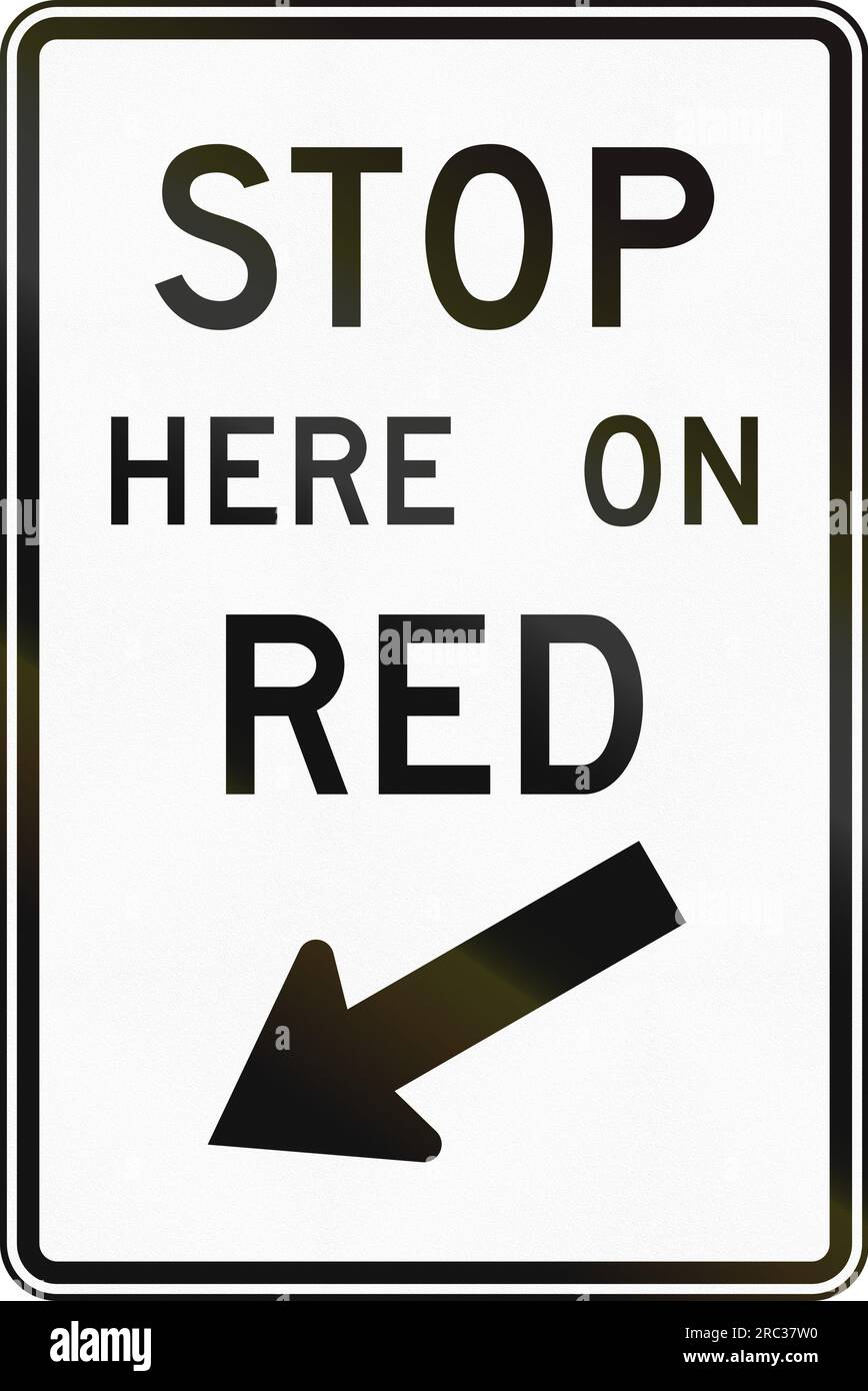 United States traffic sign: Stop here on red sign Stock Photo - Alamy