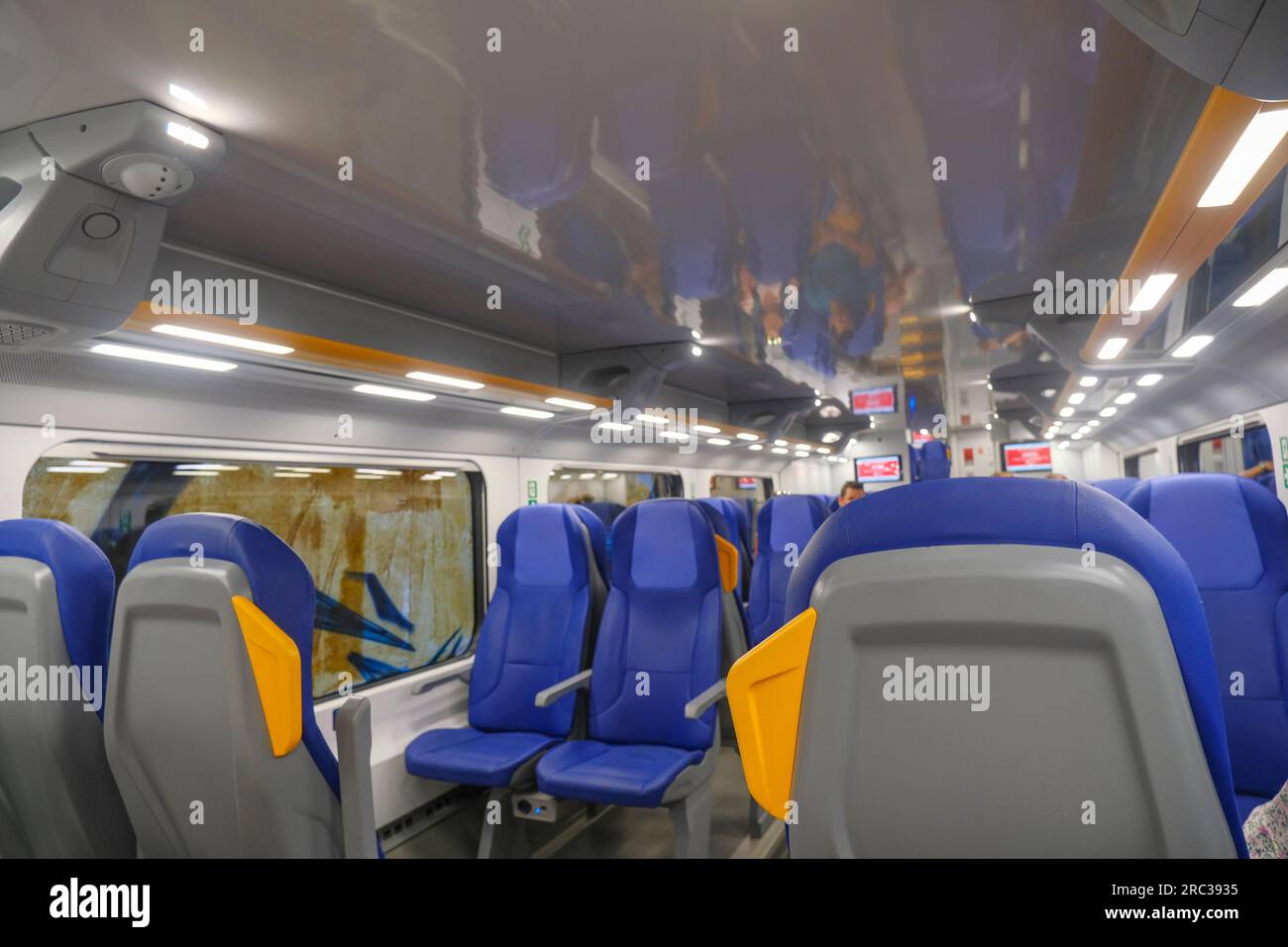 interior of the modern fast train inside and regional Italian trains ...
