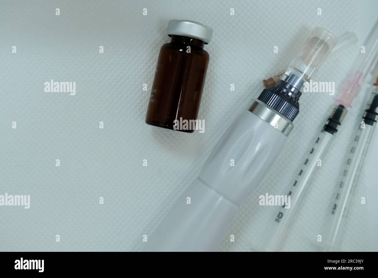 Closeup of equipment mess after microneedling procedure Stock Photo - Alamy