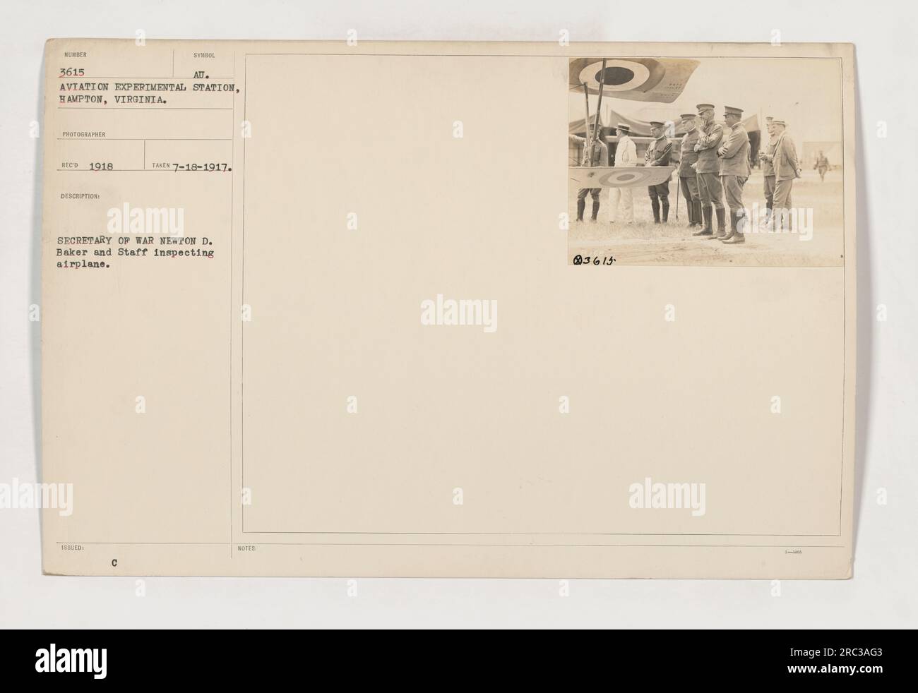 War Secretary Newton D. Baker and his staff inspecting an airplane at ...