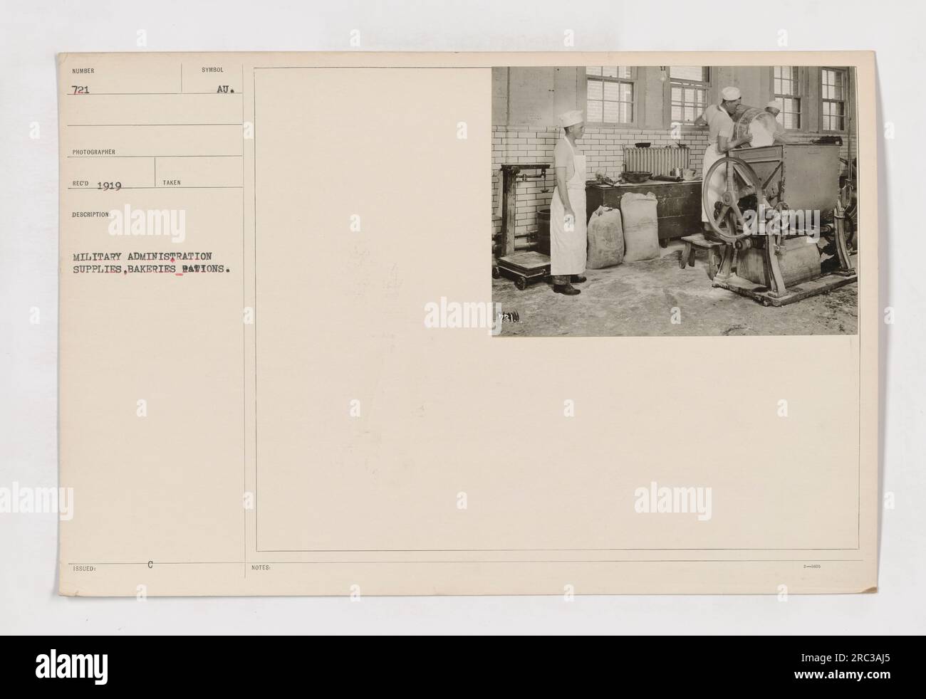 Soldiers mixing bread dough in a military bakery during World War One ...