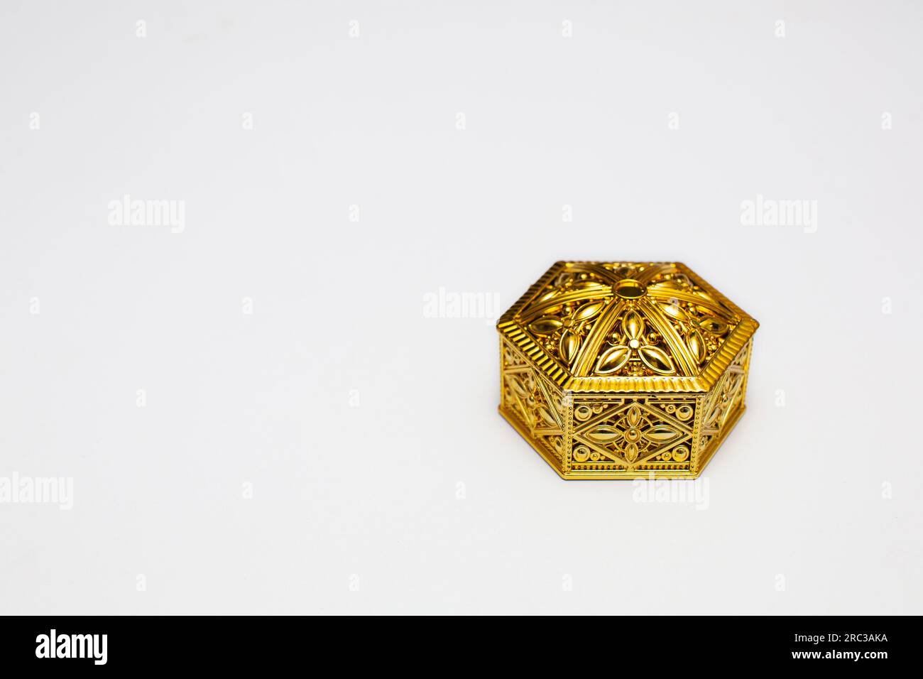 Golden gift box on white background with copy space space Stock Photo ...