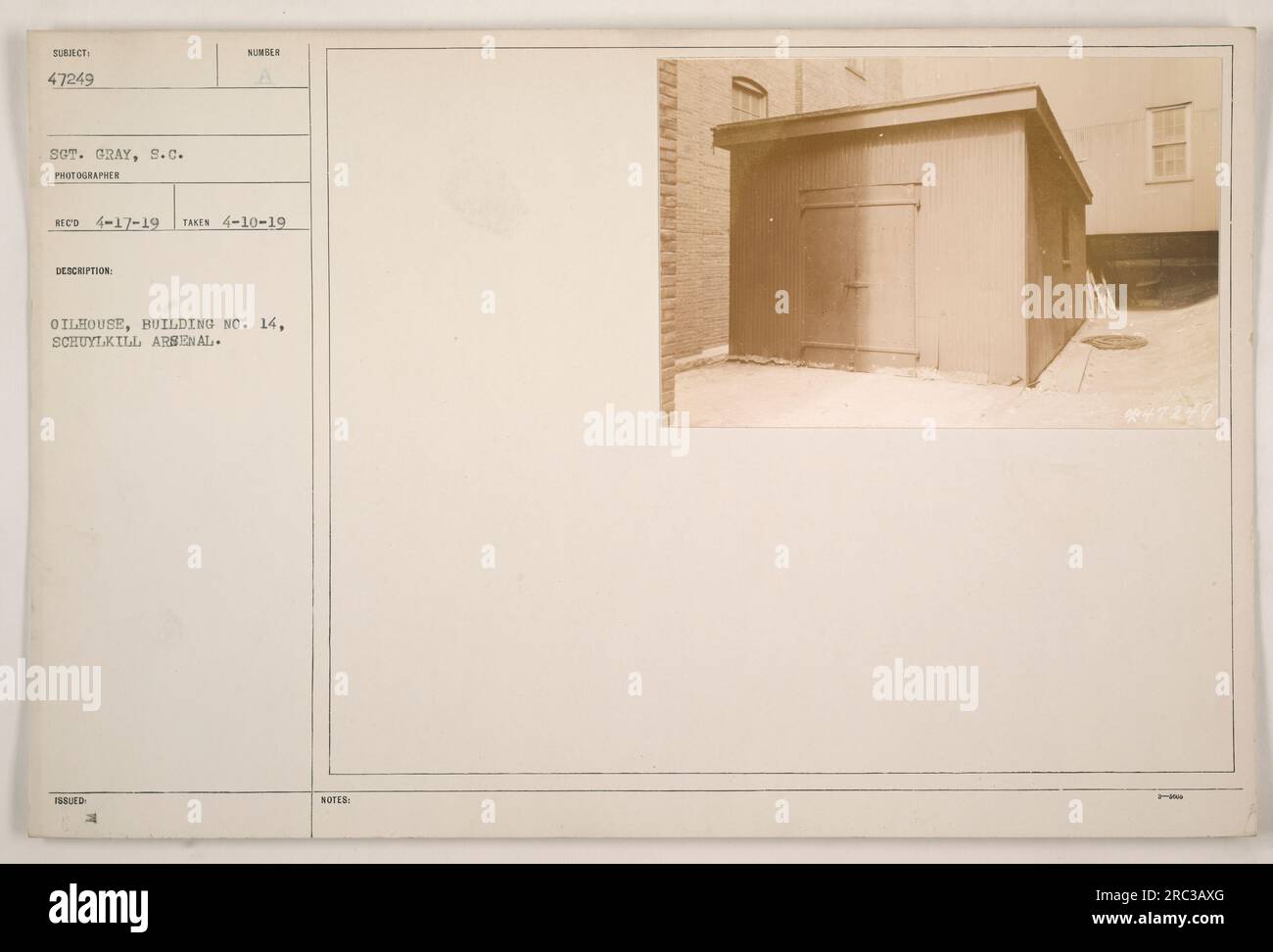 Sgt. Gray standing next to oilhouse, Building No. 14, Schuylkill ...