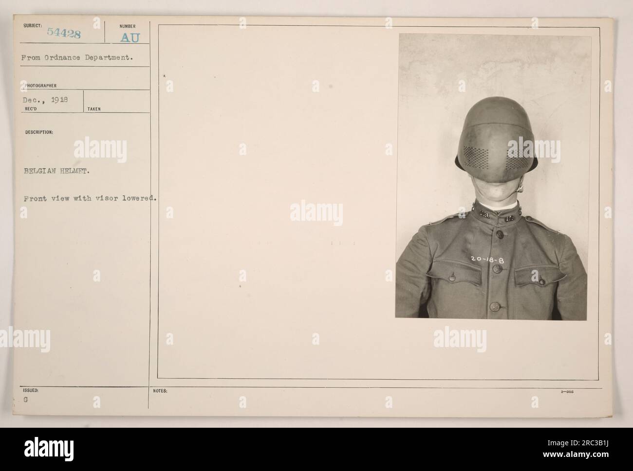 A close-up frontal view of a Belgian helmet with the visor lowered ...