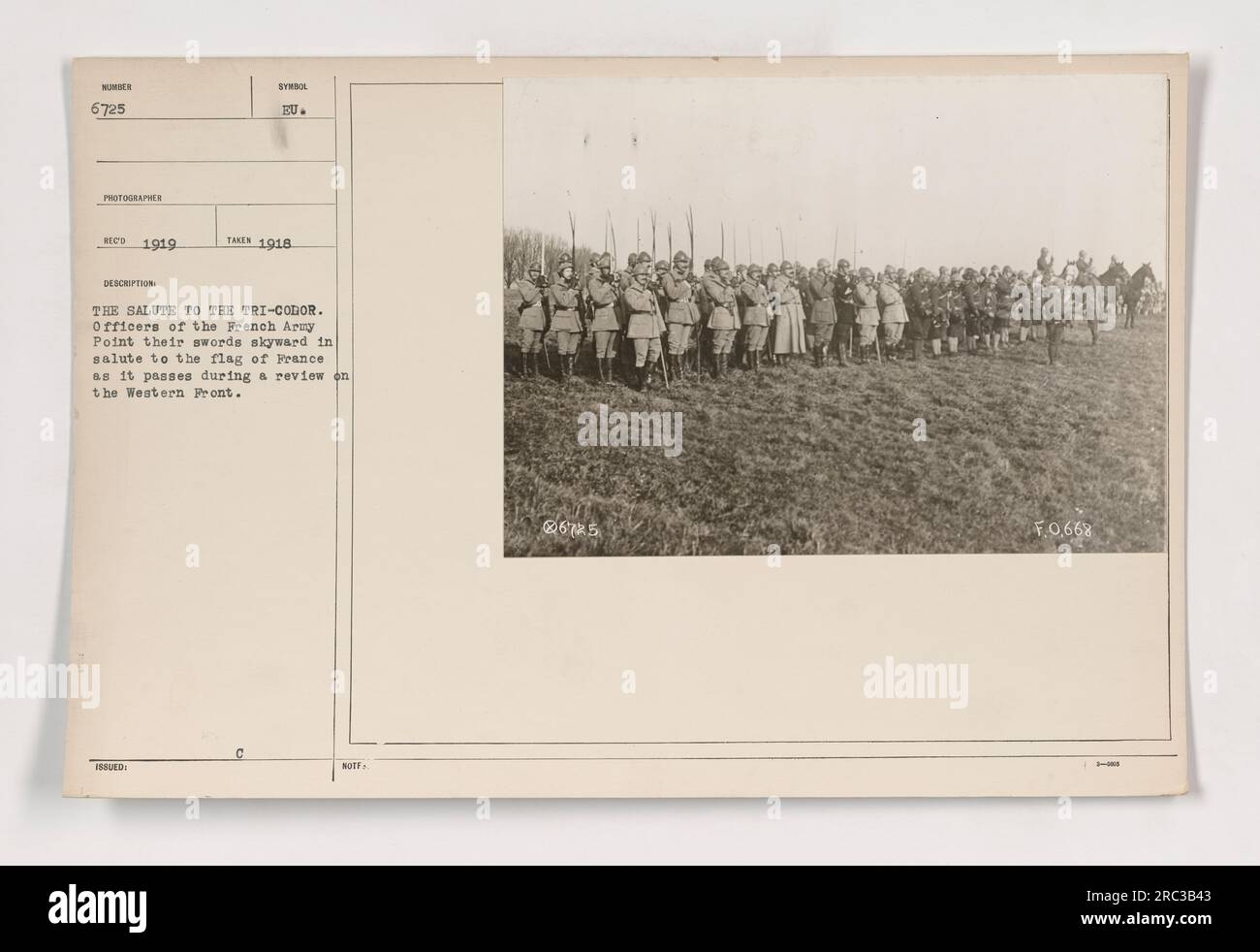 French Army officers saluting the flag of France during a review on the ...