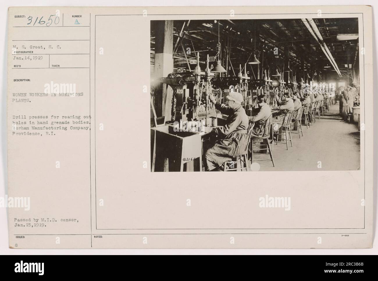 The photograph captures women workers operating drill presses at the ...