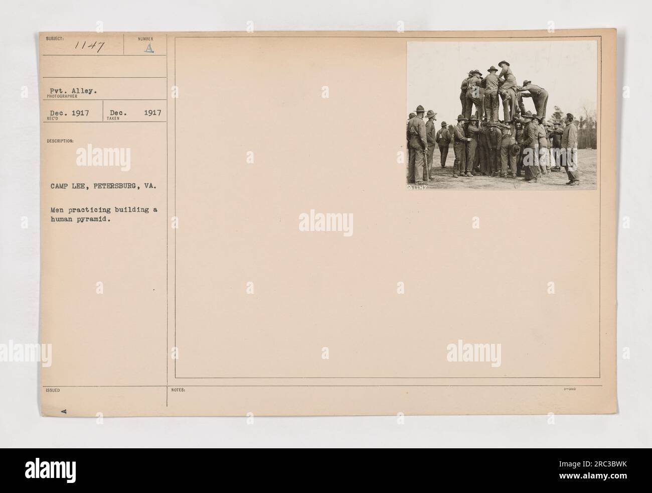 Men at Camp Lee in Virginia practicing building a human pyramid during ...