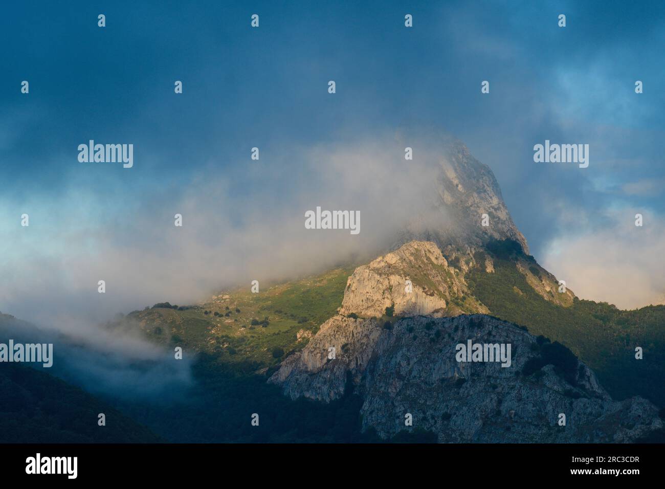 Mount Gilbo in the mist, next to Riaño Stock Photo - Alamy