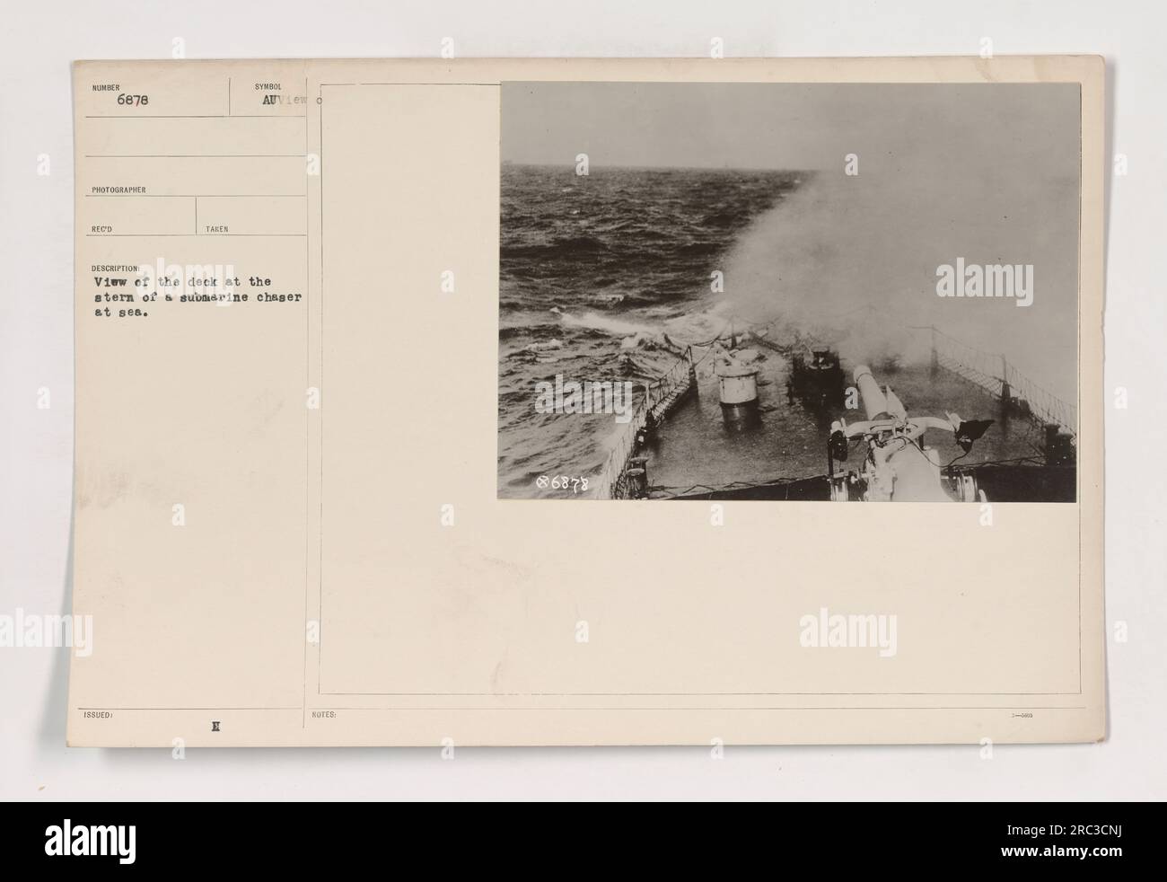Deck view of an unidentified submarine chaser NUMBER 6878 at sea. The ...