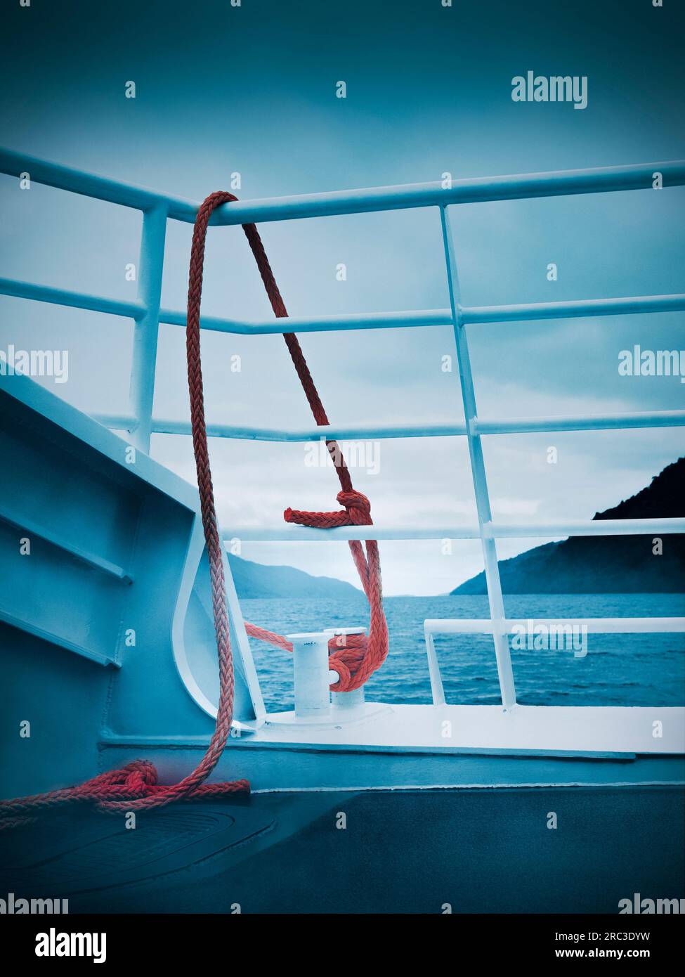 Rope tied to boat on water with blood stain - conceptual image Stock ...