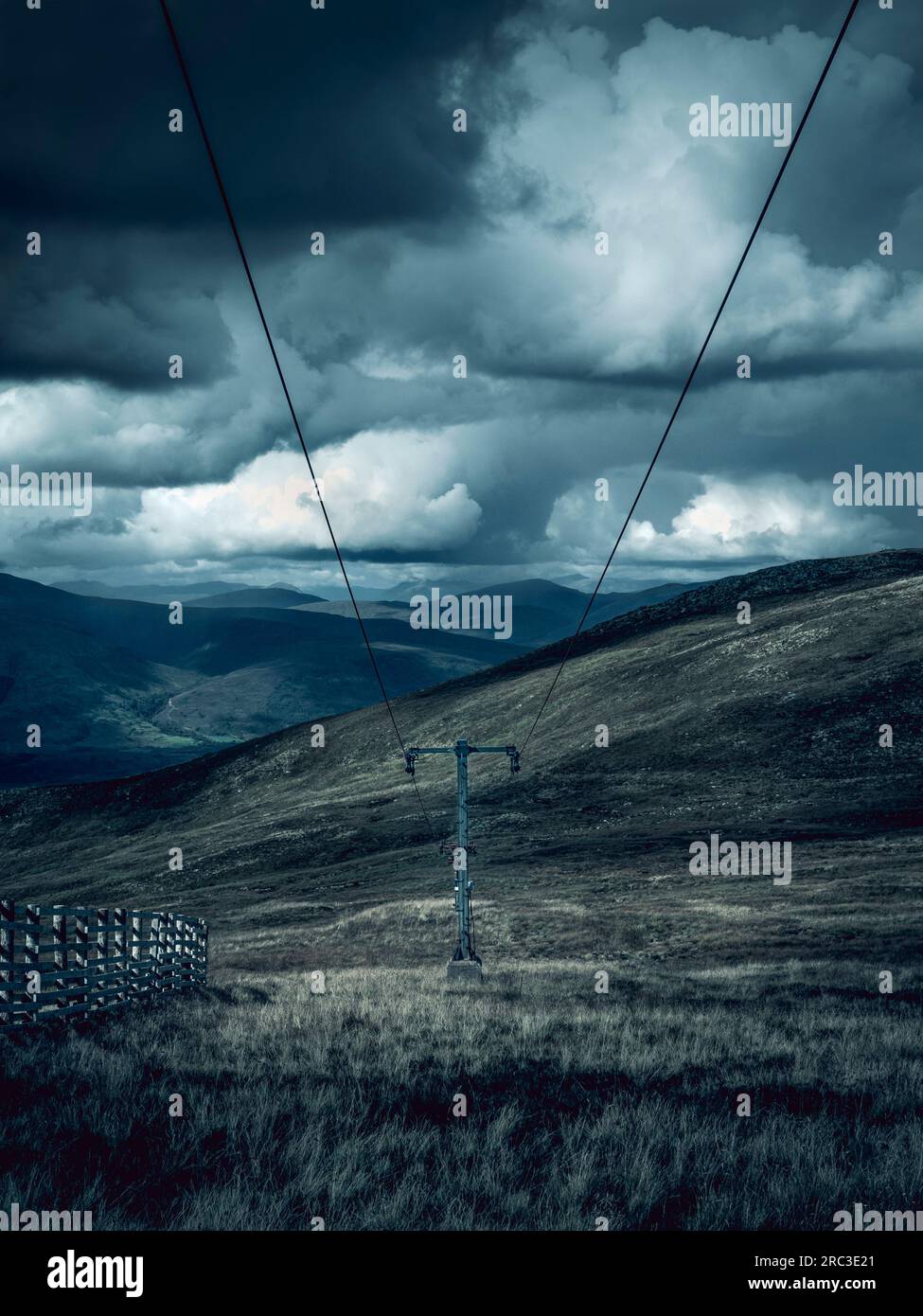 Pylon with cables on mountain Stock Photo - Alamy