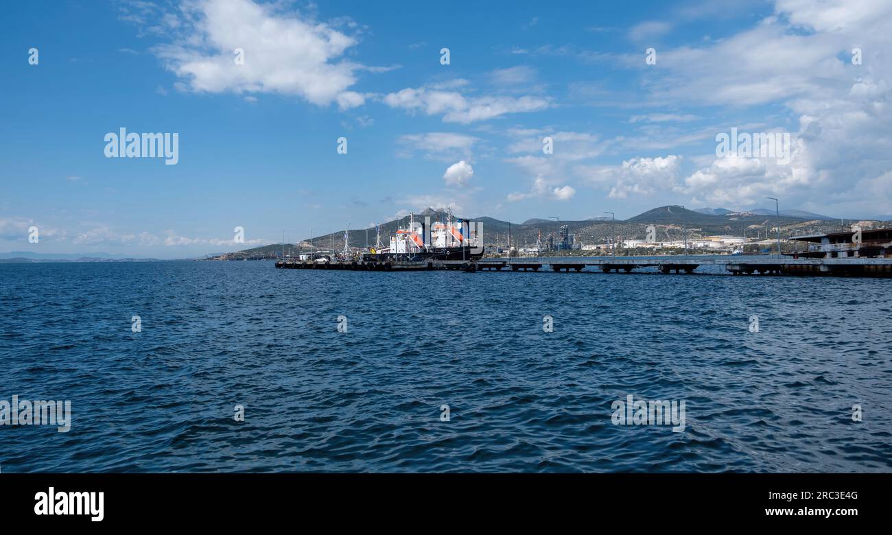 Elefsina Attica Greece. Moored ship at harbor in rippled sea opposite ...