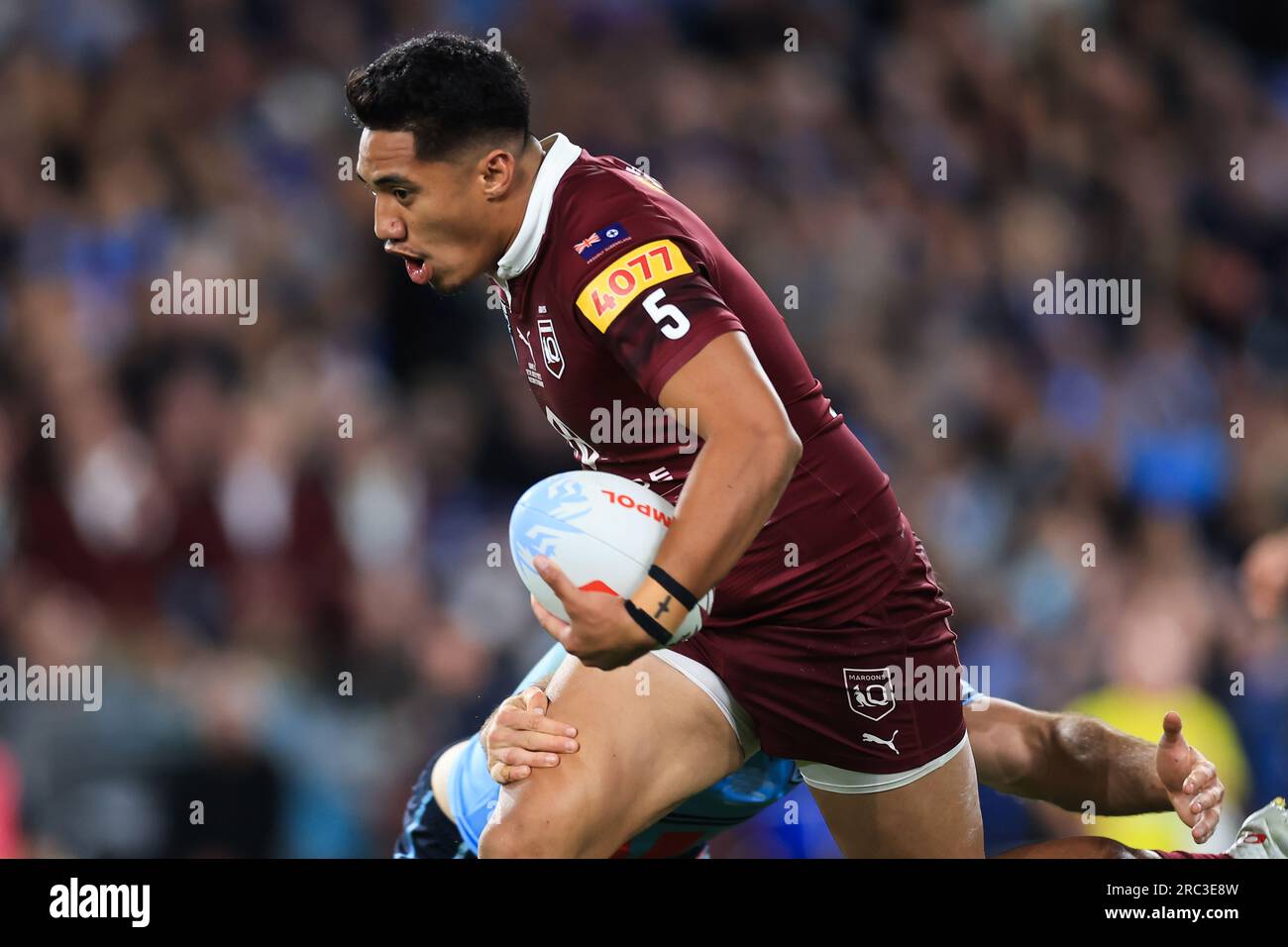 Sydney, Australia. 12th July, 2023. Murray Taulagi of the Maroons runs ...