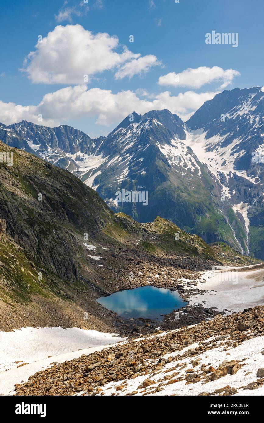 turquoise shimmering mountain lake Tälliseeli in Innertkirchen Stock ...