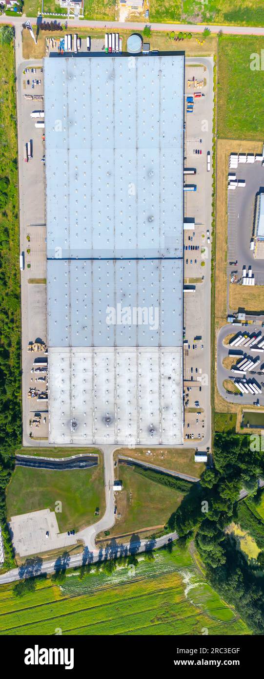 Aerial view of goods warehouse. Logistics center in industrial city ...