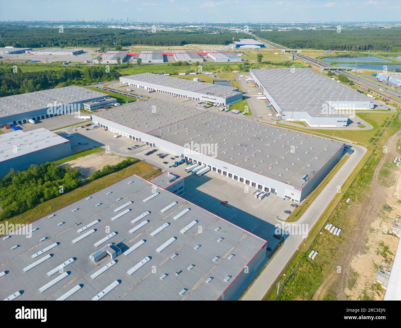 Aerial view of the logistics park with warehouse, loading hub and many ...